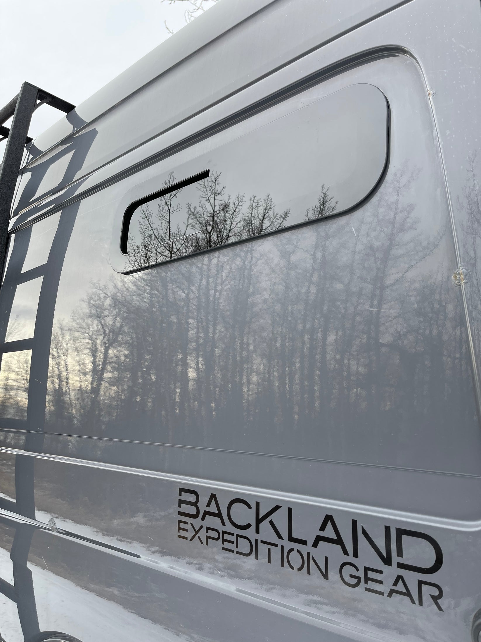 INSTALLATION: Small Window into Van Panel | Backland Expedition Gear